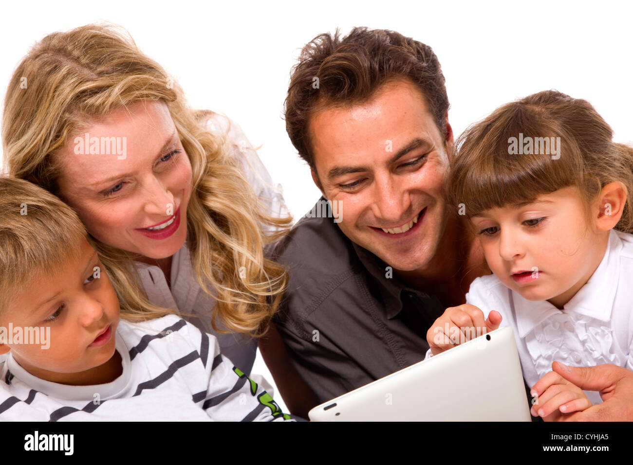 family using digital tablet Stock Photo - Alamy