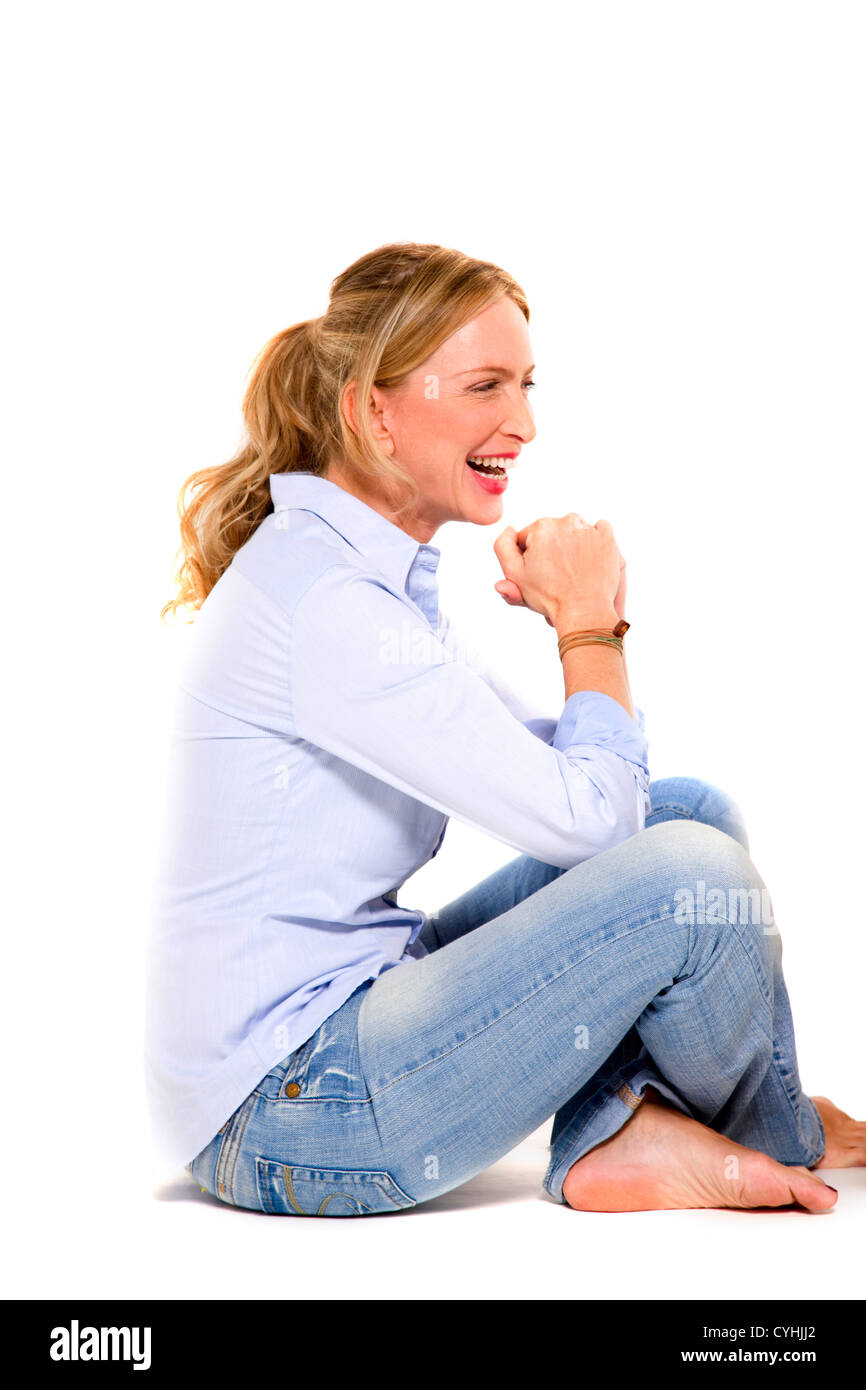 smiling woman sitting Stock Photo - Alamy