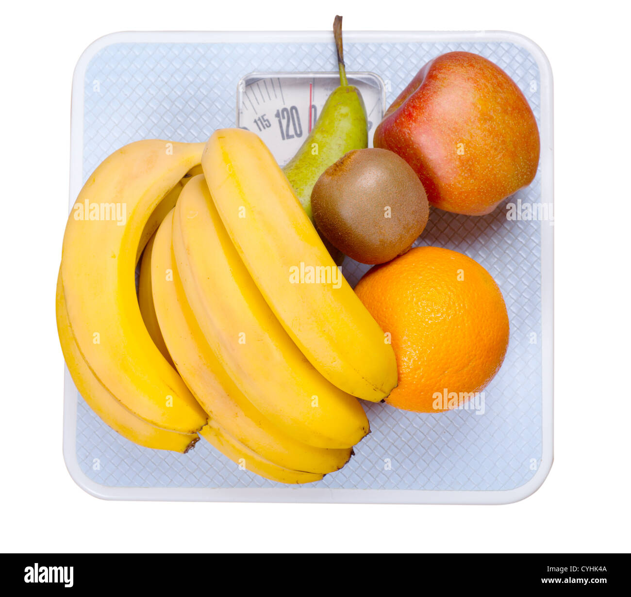 Fruits on a scales isolated over white Stock Photo - Alamy