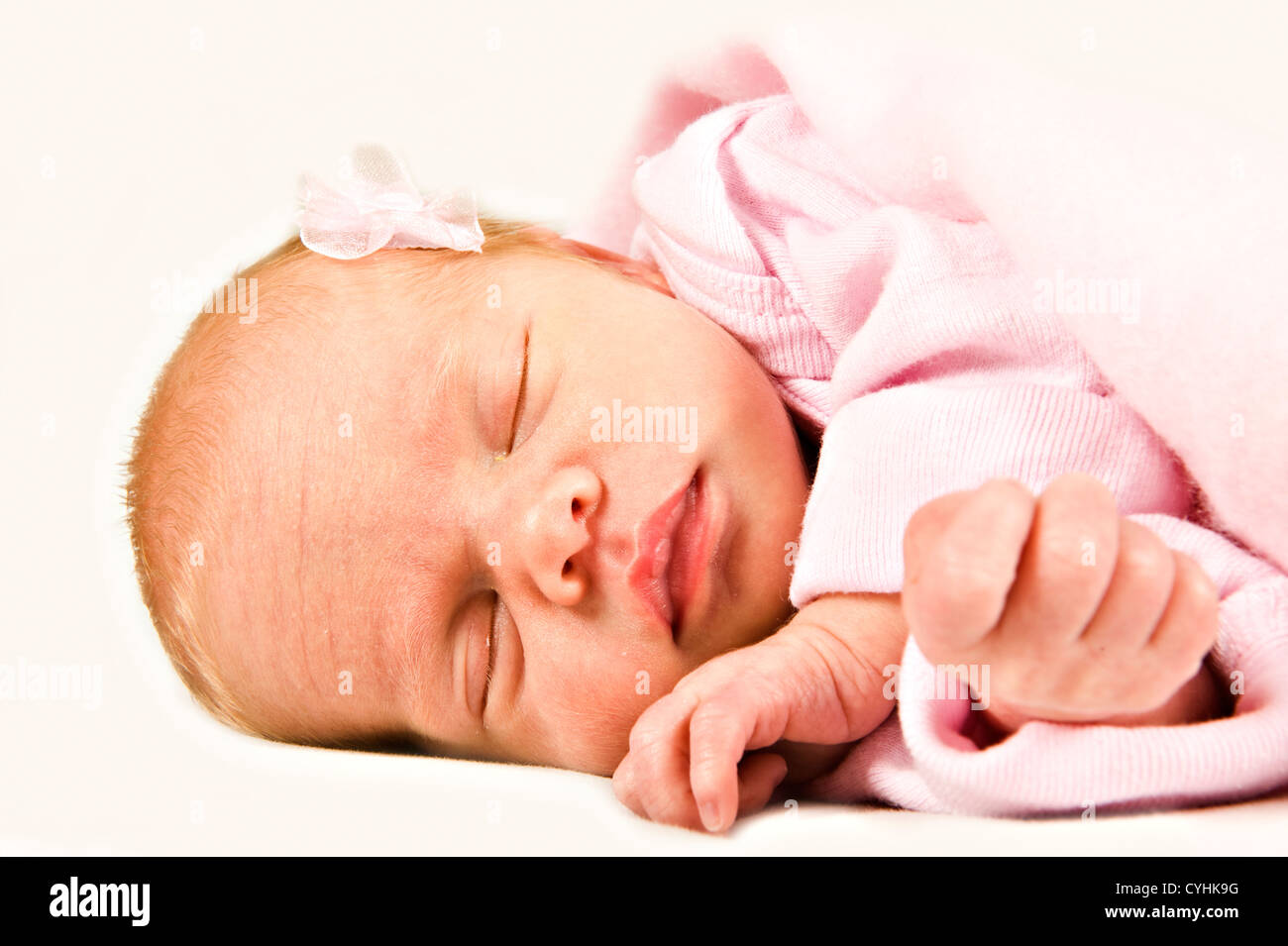 New born baby girl in pink Stock Photo - Alamy