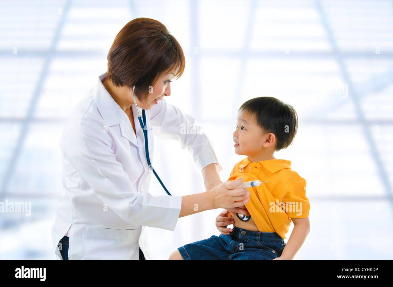 Children's doctor exams infant with stethoscope Stock Photo - Alamy