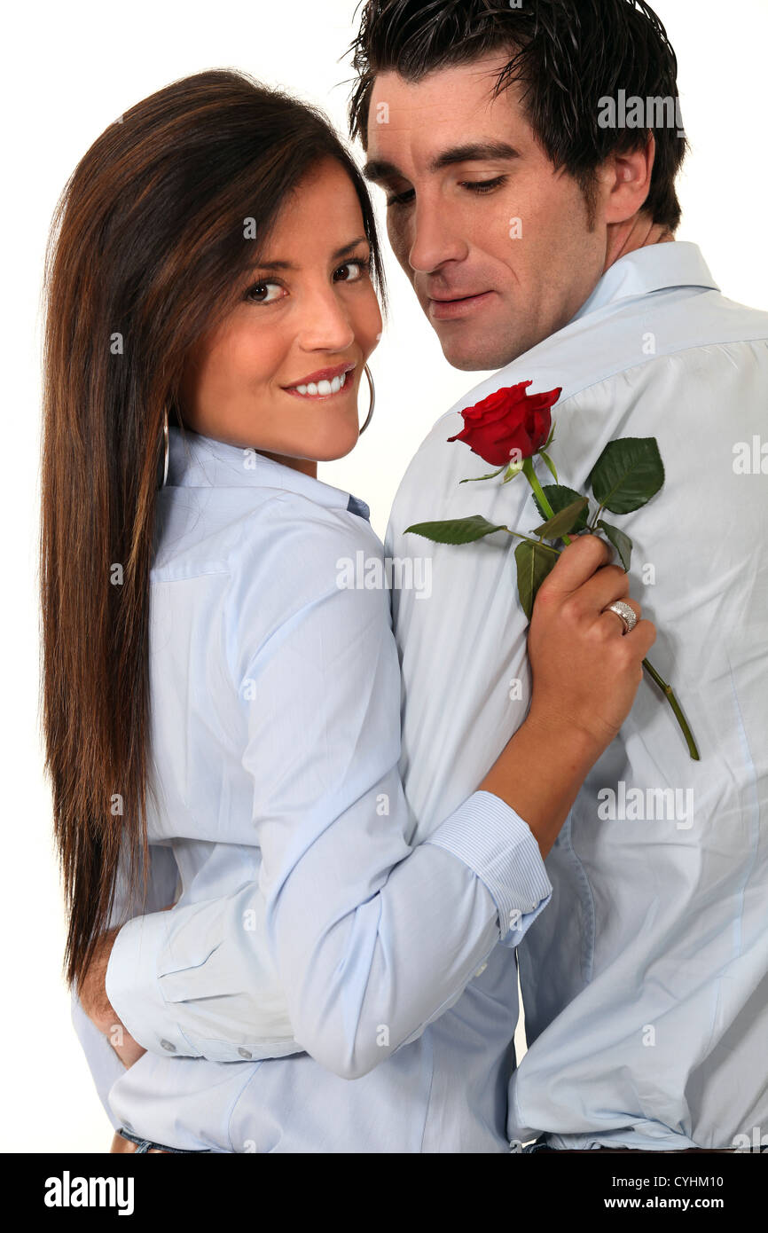 Couple with a red rose Stock Photo - Alamy
