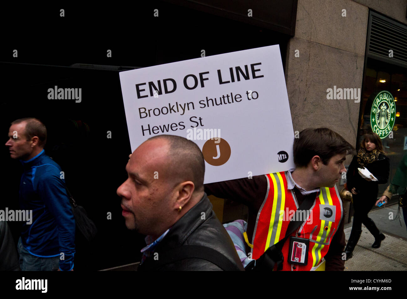 Long lines commuters wait hi-res stock photography and images - Alamy
