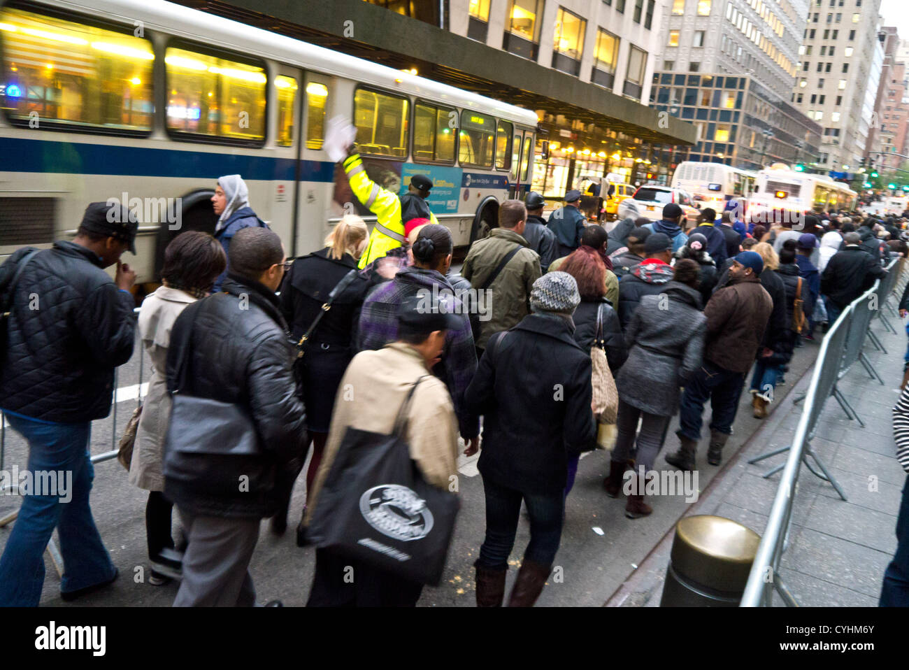NEW YORK - NOVEMBER 2: Commuters wait in long lines for Bus service ...