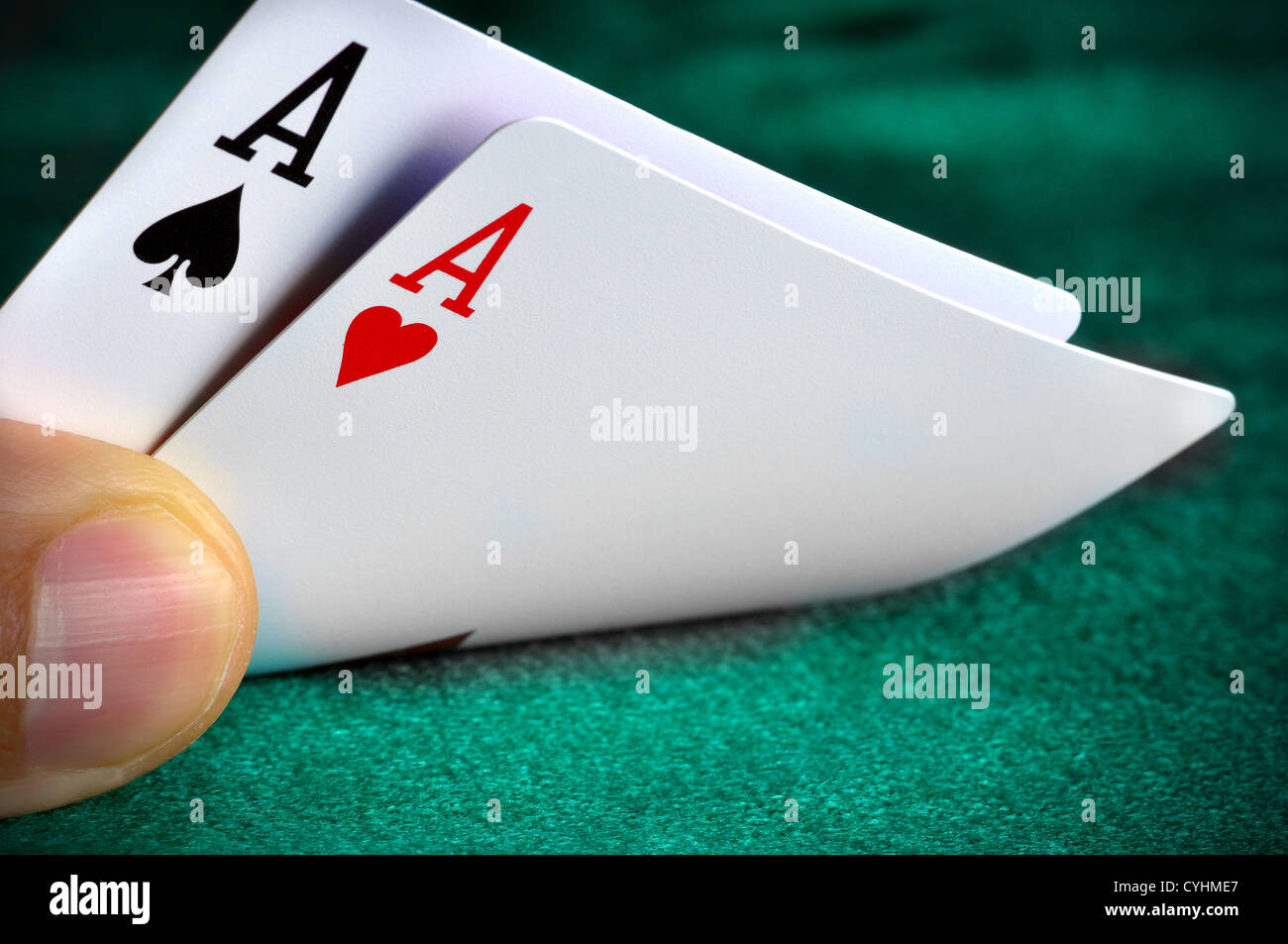 Hand gambler checking playing cards hi-res stock photography and images ...