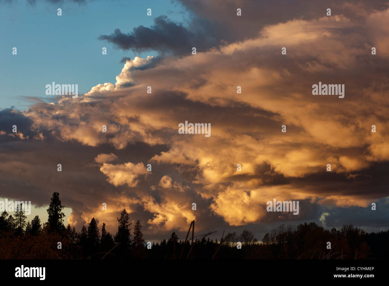 Light reflects off the clouds during a beautiful sunset Stock Photo - Alamy