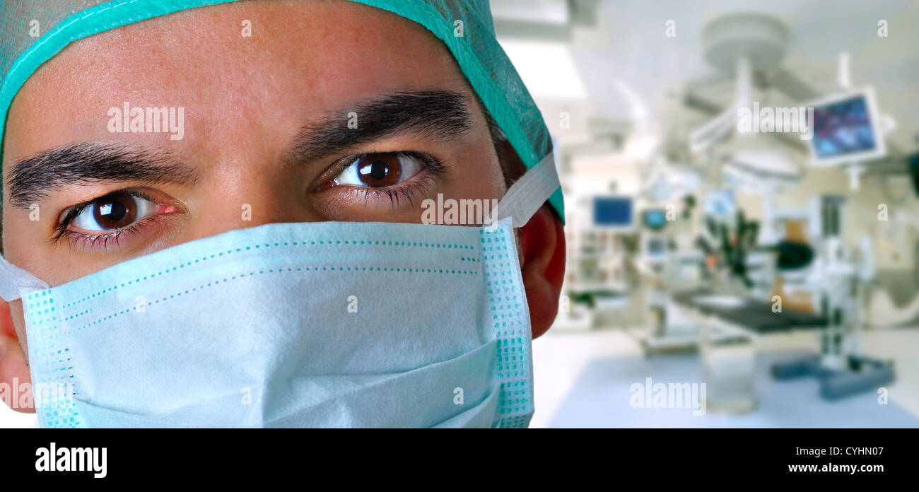 Closeup portrait of a surgeon with a operating room behind Stock Photo ...