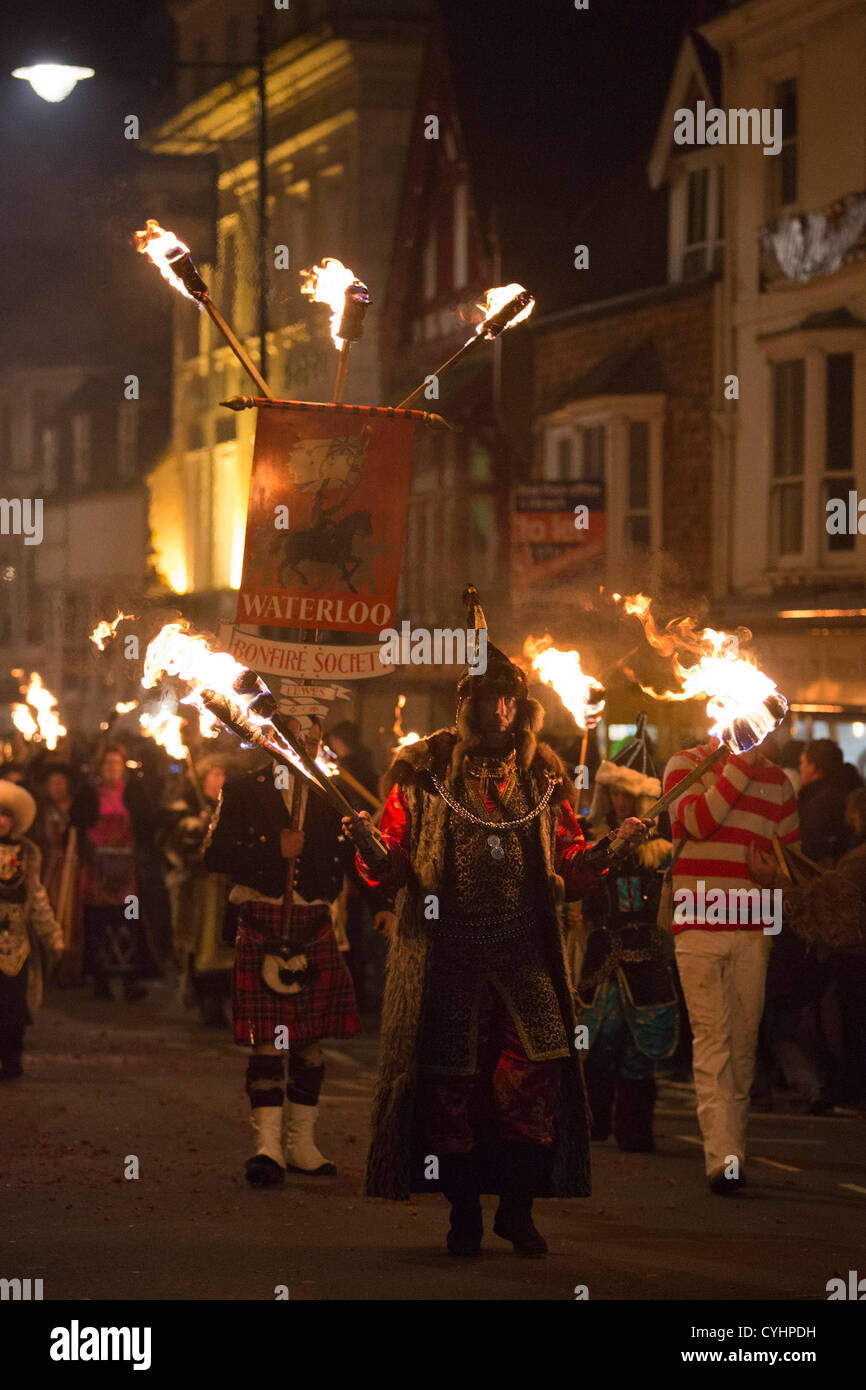 Lewes bonfire societies parade down the High Street of Lewes in East ...
