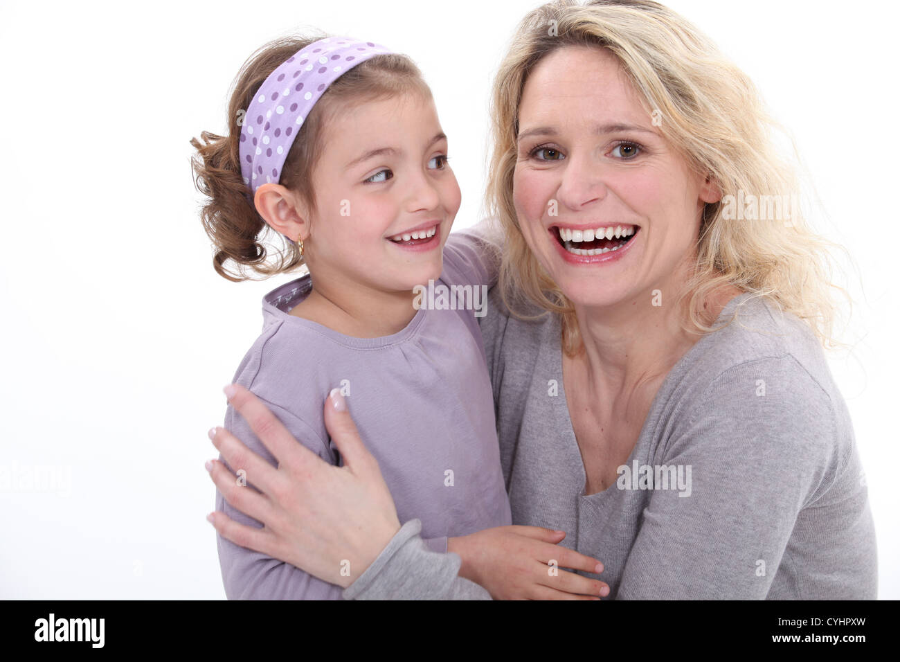 mother embracing her little daughter Stock Photo - Alamy