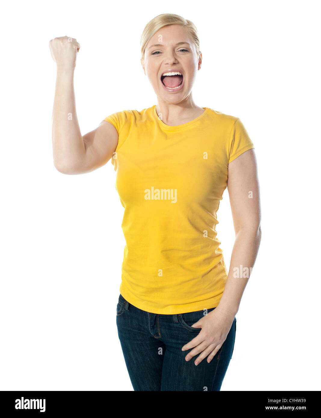 Fashionable teenager poisng with raised arms, shouting loud Stock Photo ...