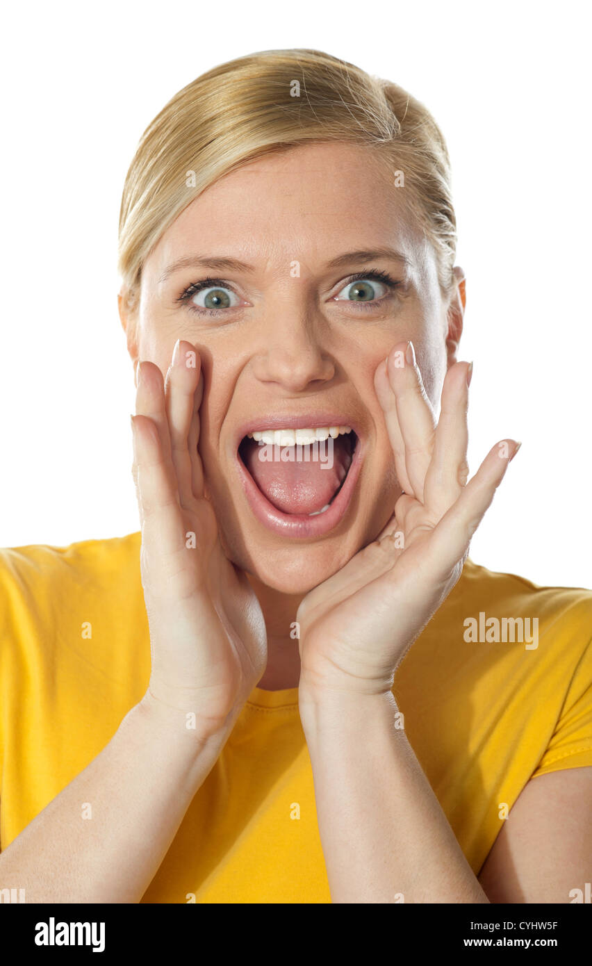 Cute girl shouting in front of camera against white background Stock ...