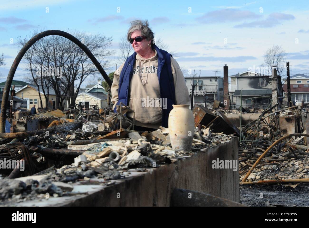 Nov. 5, 2012 - Queens, New York, U.S. - Maureen Early looks over the ...