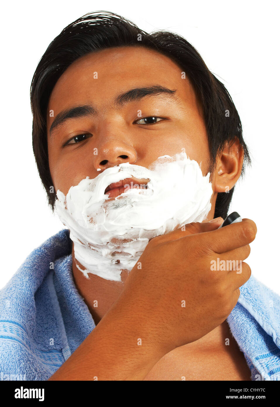 Young Man Shaving To Remove His Stubble Stock Photo - Alamy