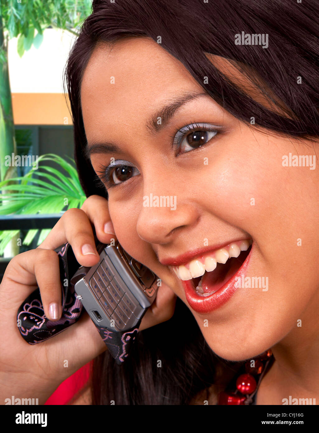Pretty Girl Chatting On The Phone To Her Friend Stock Photo - Alamy