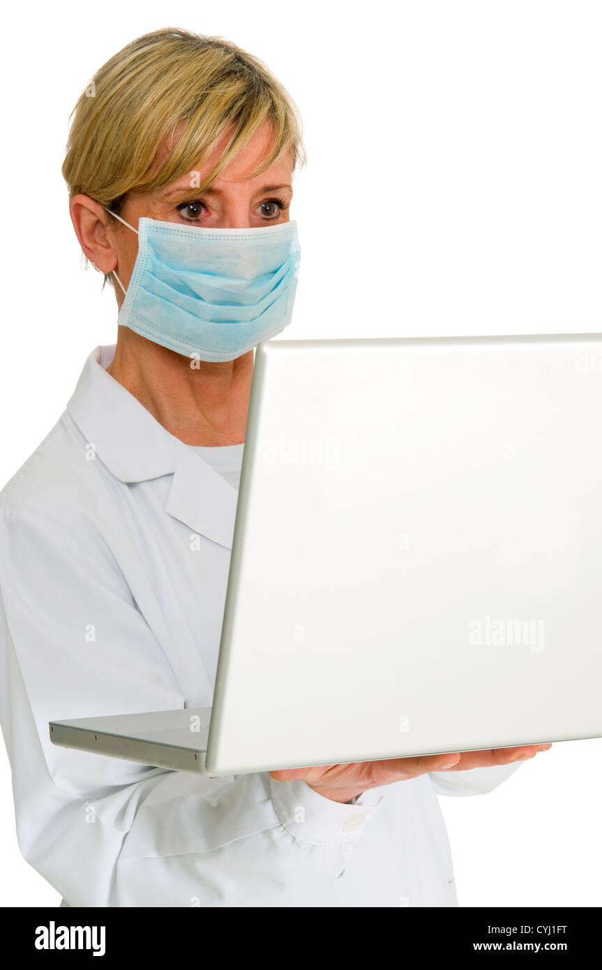 female doctor with mask and laptop Stock Photo - Alamy