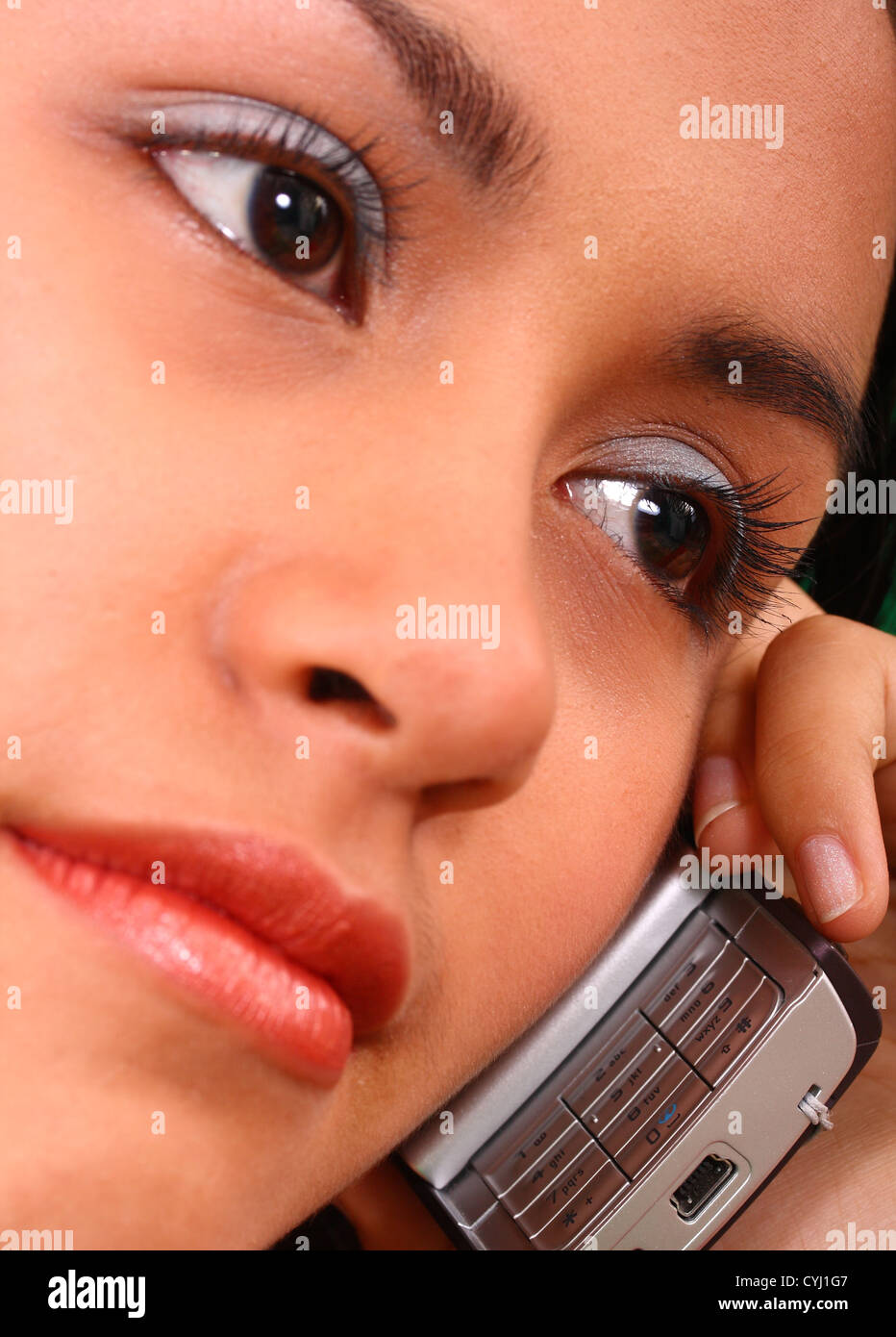 Girl Making A Phone Call To Her Friend Looking Worried And Concerned ...