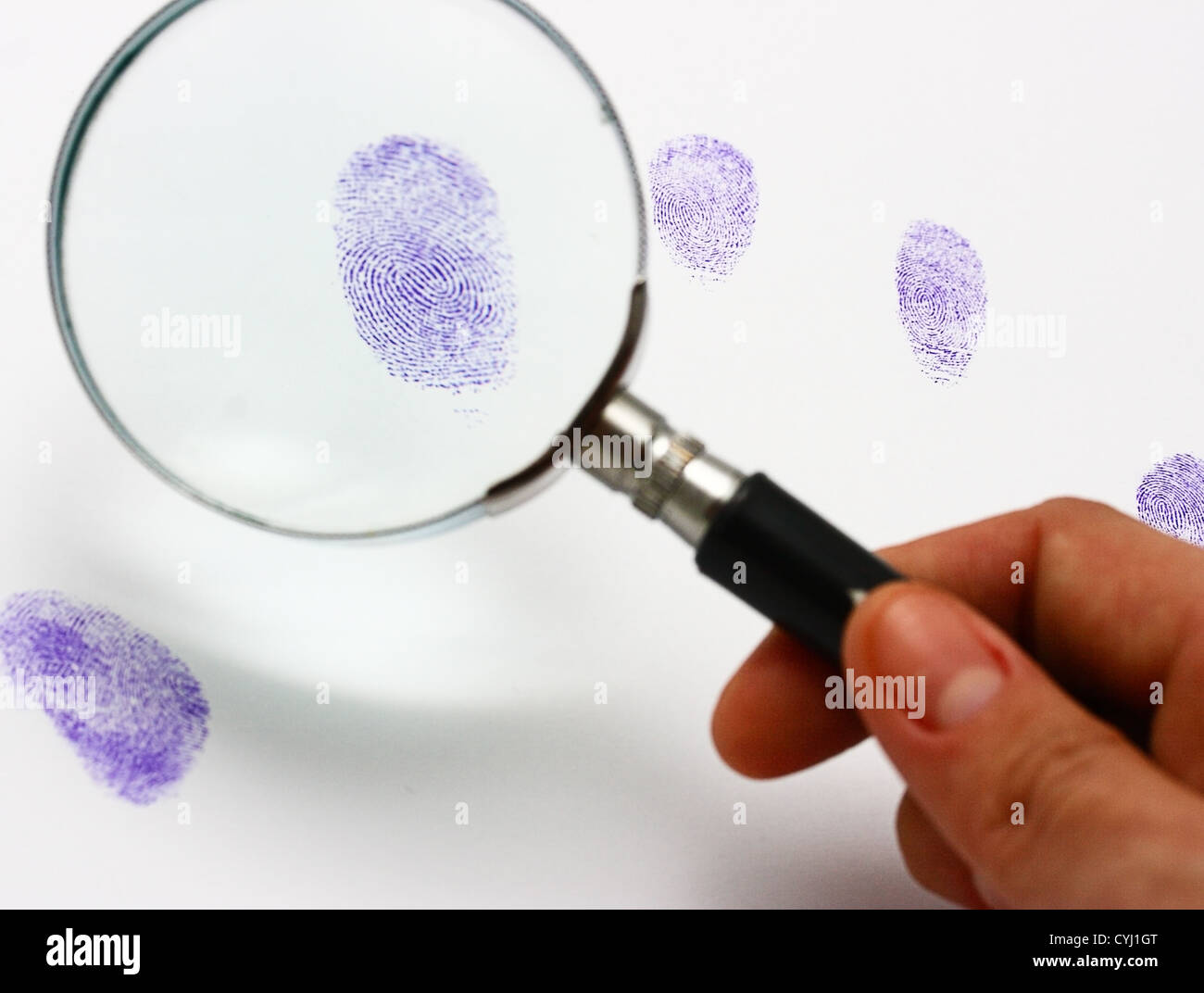 Police Examine A Fingerprint Left By A Suspect Stock Photo - Alamy