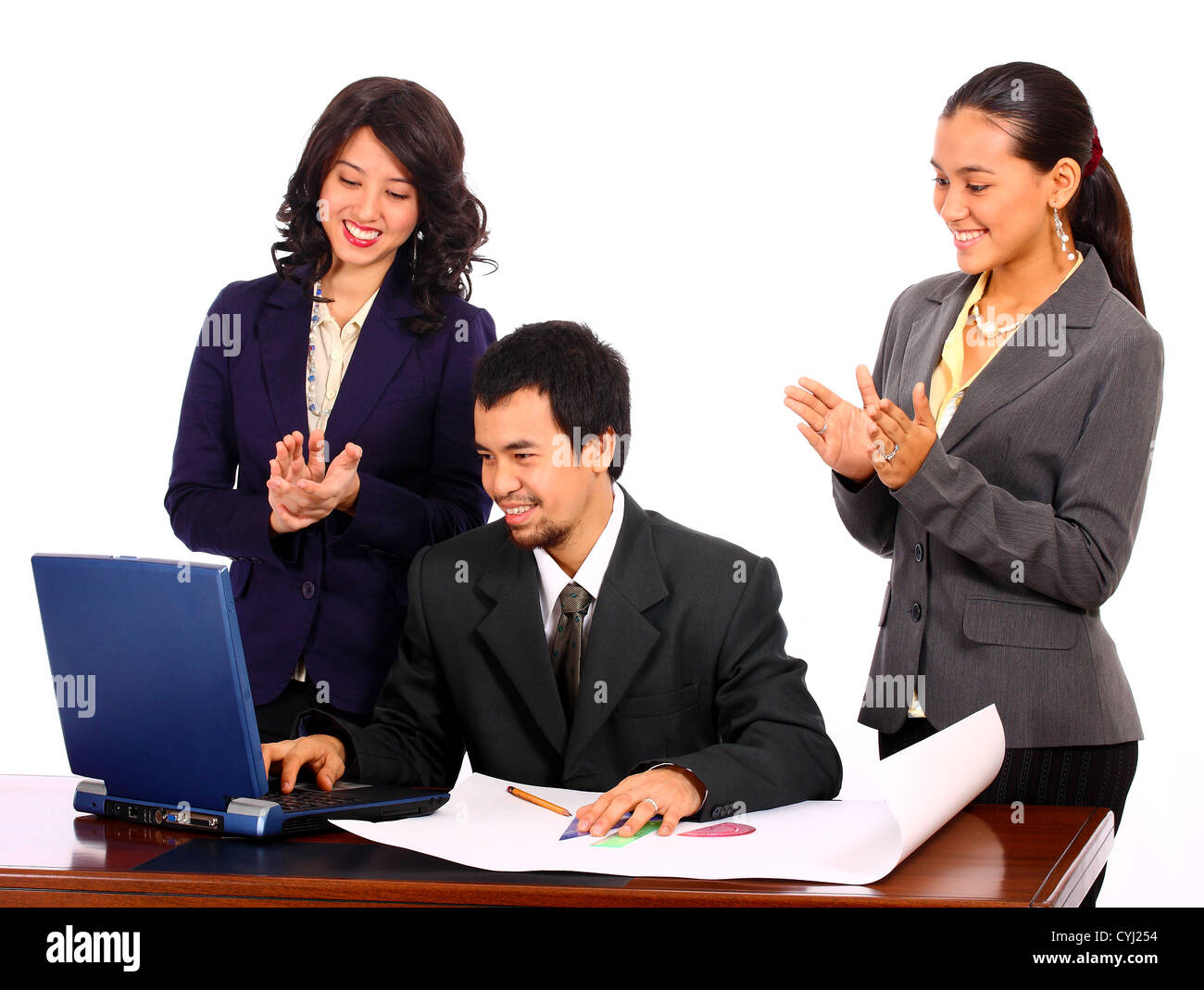 Group Of Office Workers Looking At The Computer Celebrating Their ...