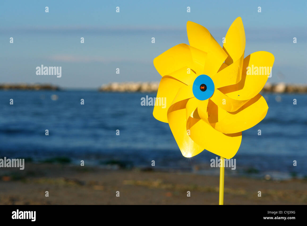 Windwheel at the beach..........Wind wheel on the beach Stock Photo - Alamy