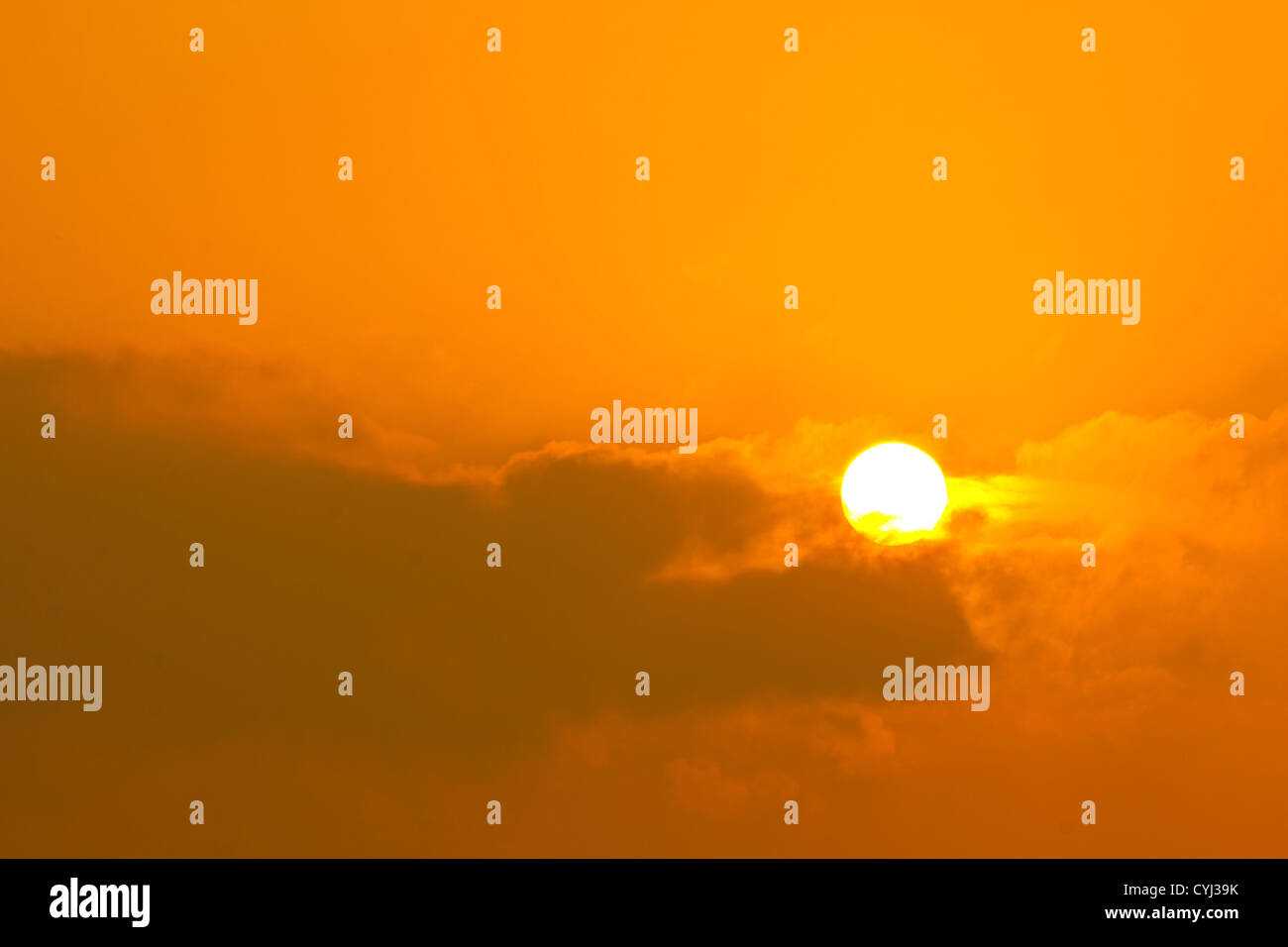 Sun at sunset Stock Photo - Alamy