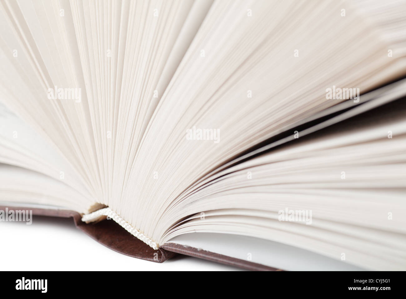 Macro view of binder of thick book over white background Stock Photo ...