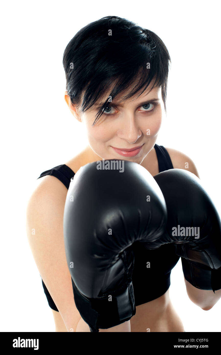 Attractive caucasian girl practicing boxing, isolated on white ...
