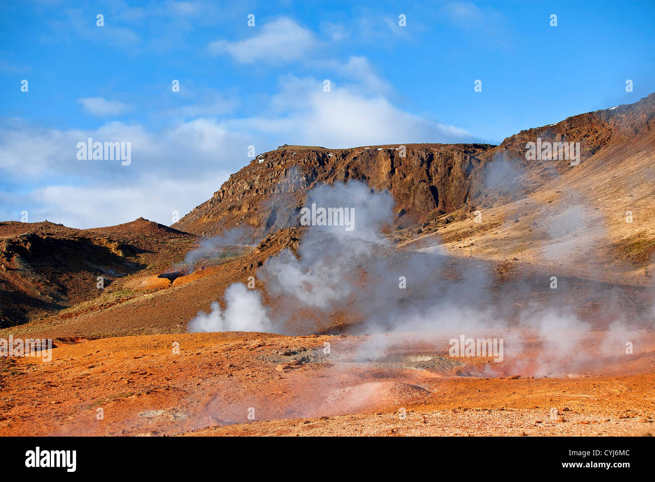 Smoke rising from hot springs in Iceland Stock Photo - Alamy