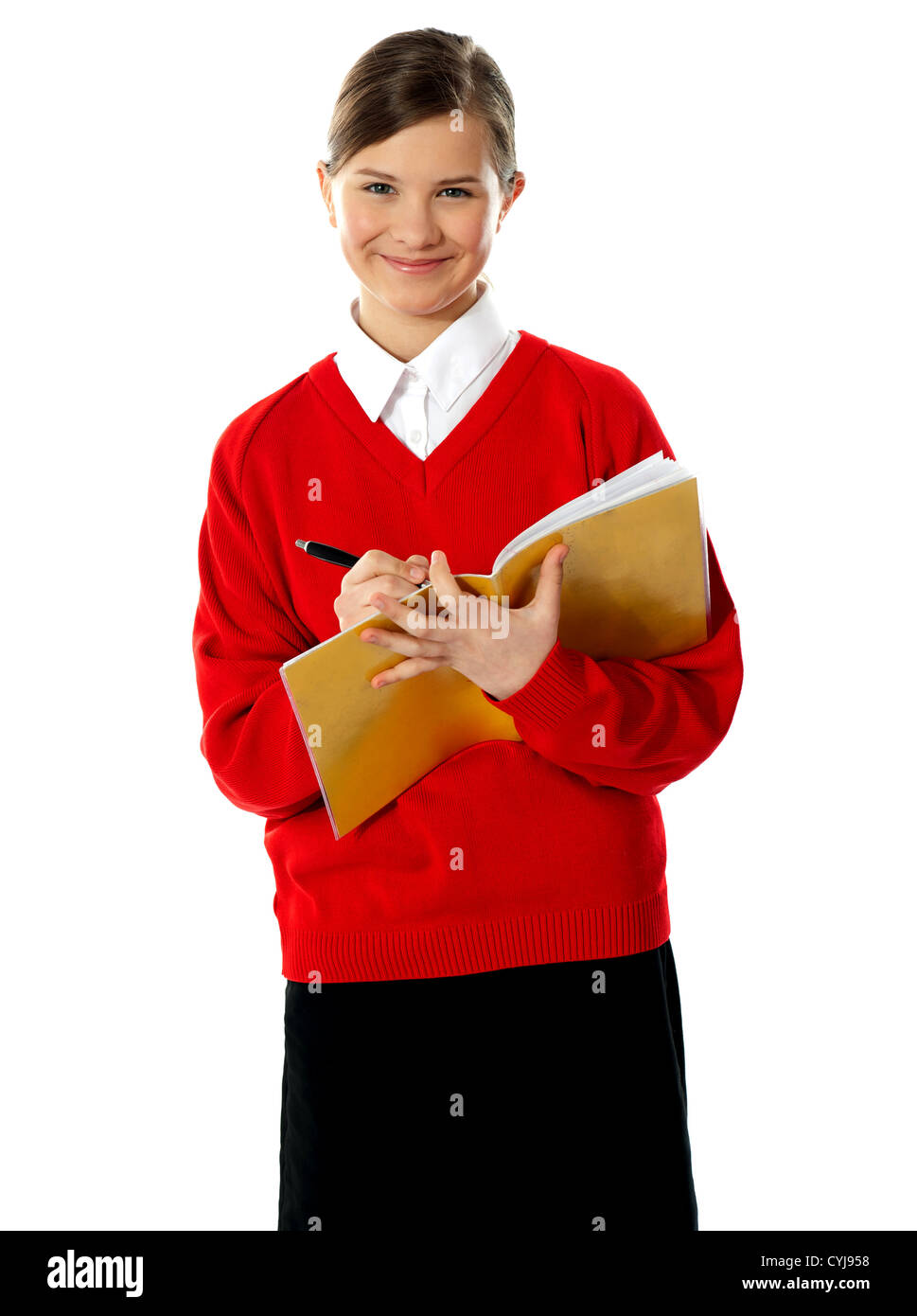 Little caucasian student school girl writing on her notebook isolated ...