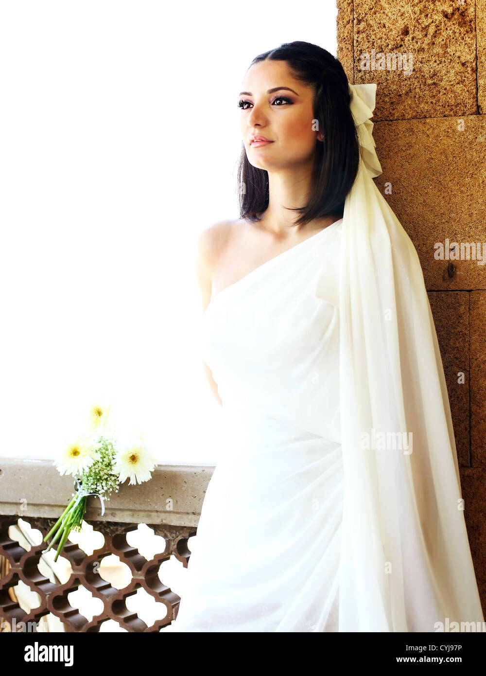 Young happy smiling bride with flowers, wedding day Stock Photo - Alamy