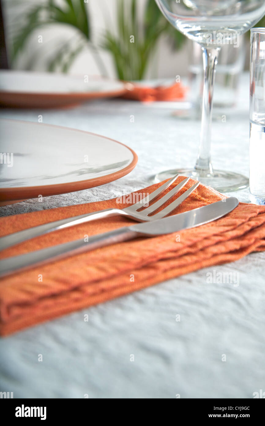 detail of cutlery and serviette at lonely table restaurant Stock Photo ...