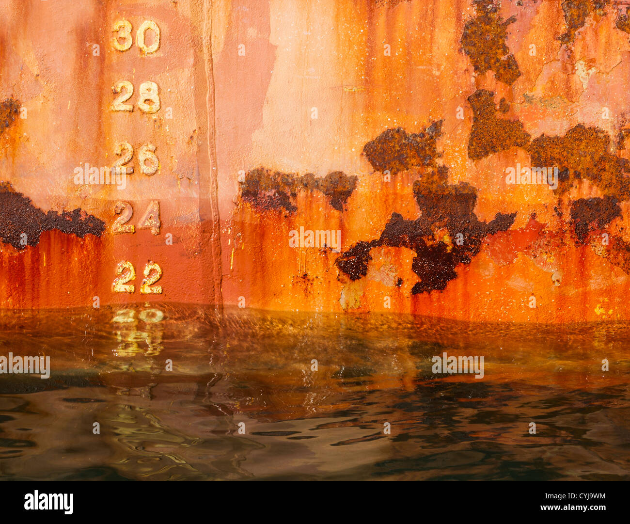 Draft markings on bow of rusty ship Stock Photo - Alamy