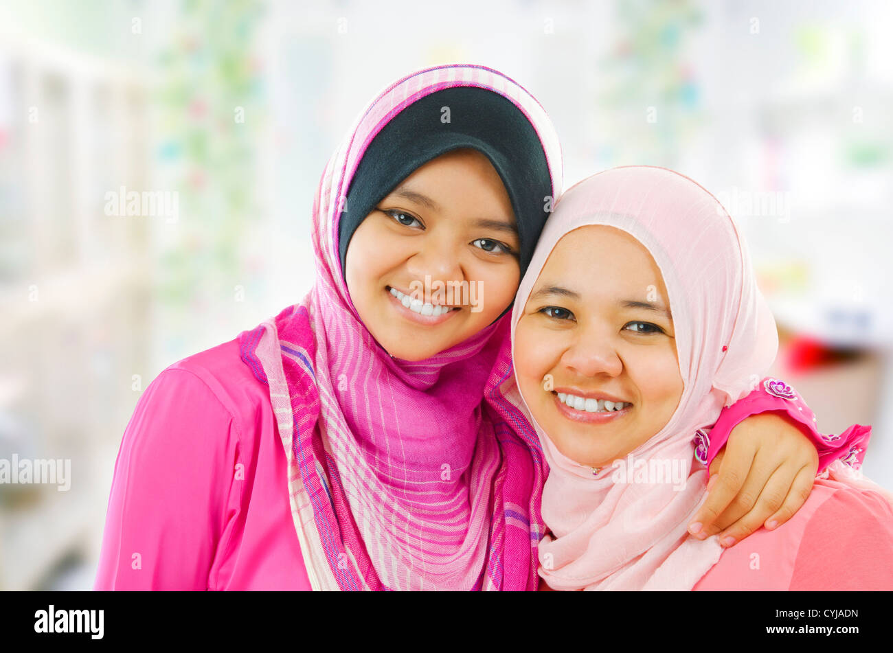 Arab family home traditional clothing hi-res stock photography and ...