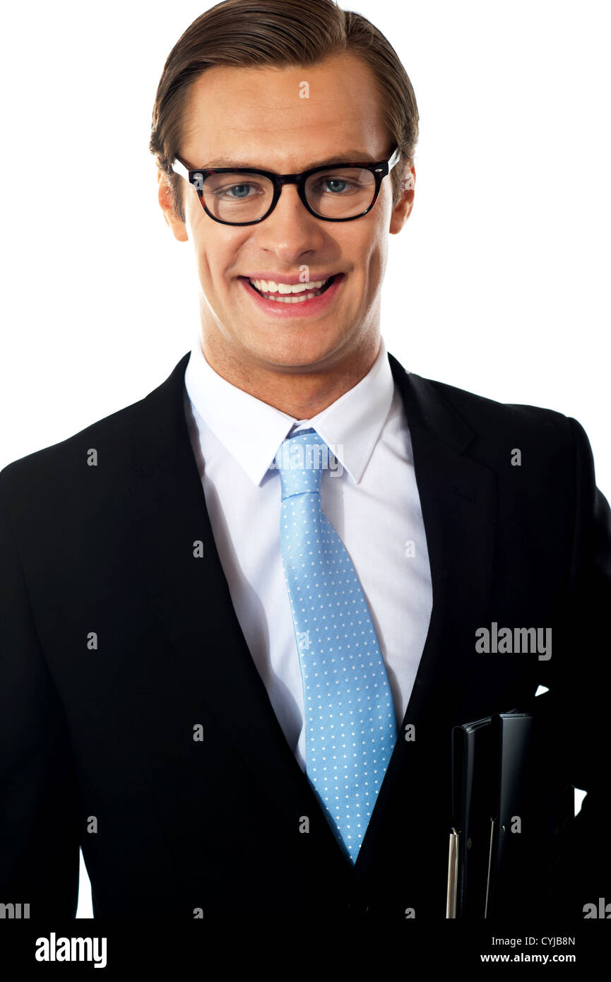 Closeup of smiling corporate young man isolated against white ...