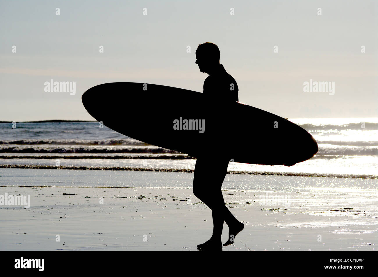 Male surfing red wetsuit hi-res stock photography and images - Alamy