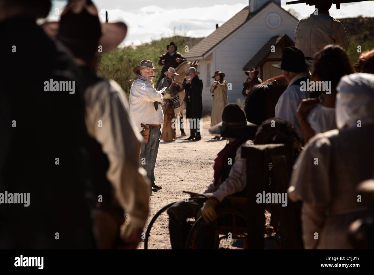 Cocky gunfighter waves back crowd in an old west showdown Stock Photo ...