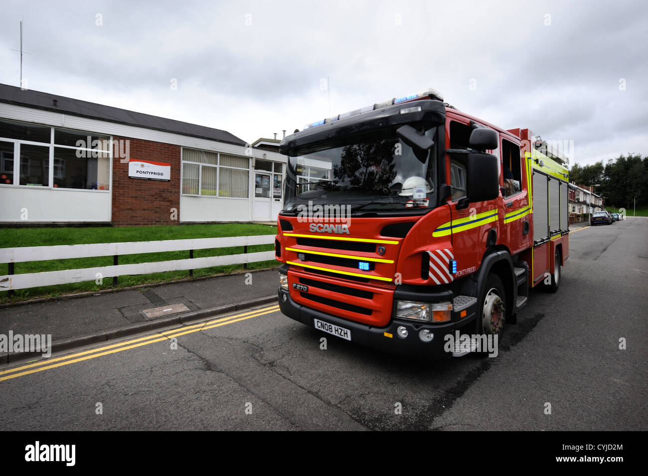 An engine leaves Pontypridd Fire Station in South Wales UK Stock Photo ...