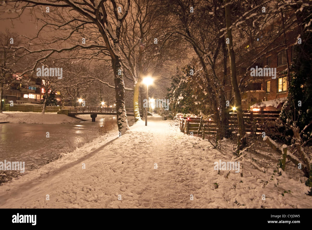 Amsterdam in the Netherlands at night covered with snow Stock Photo - Alamy