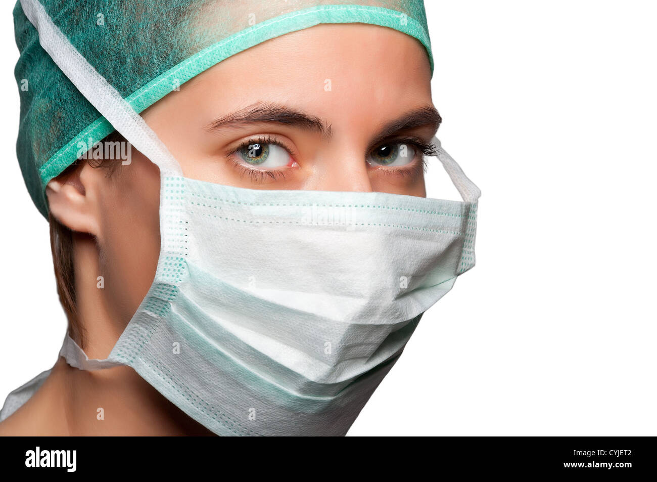 Closeup portrait of a female surgeon isolated in a white background ...