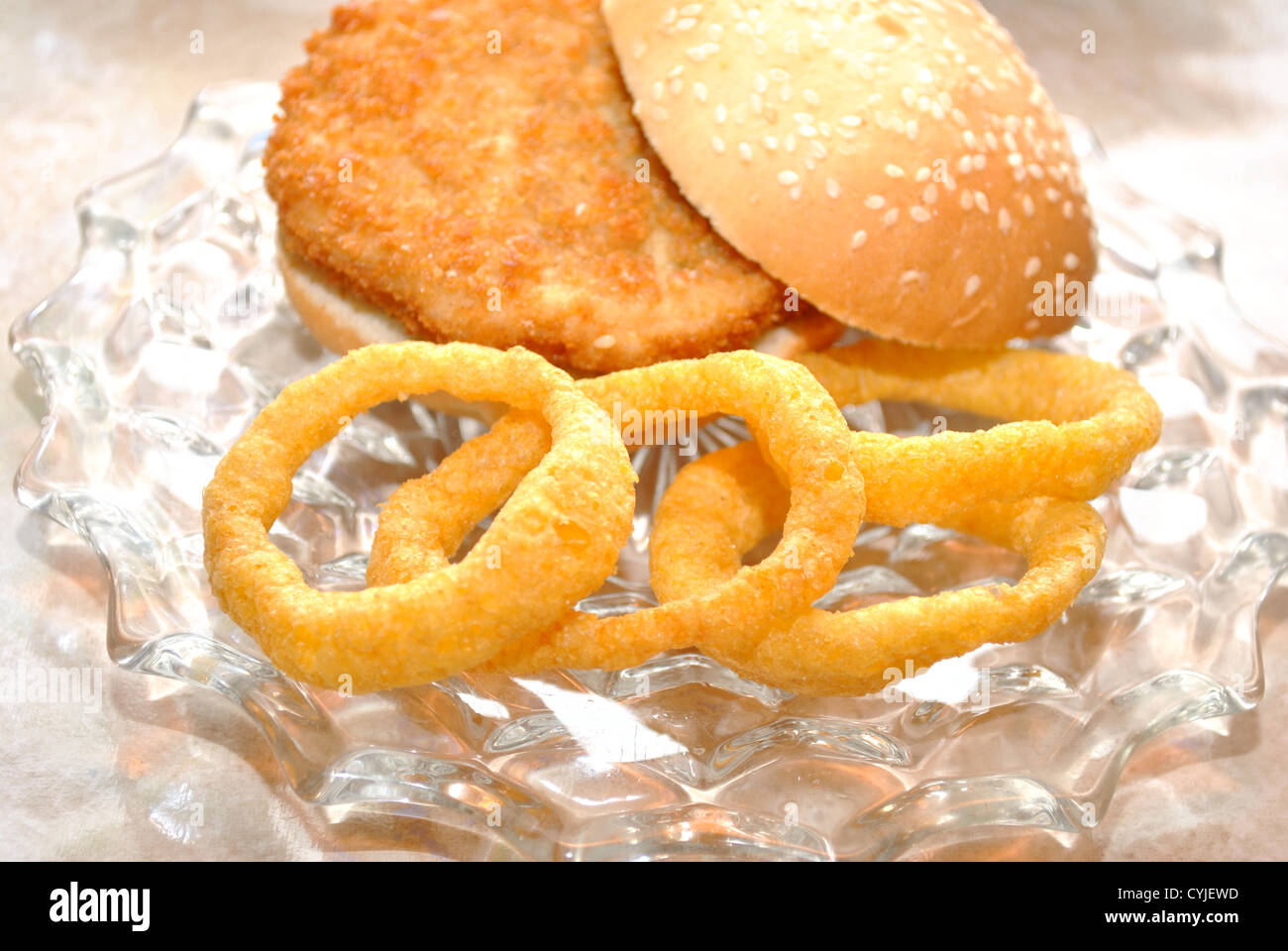 Onion Rings with A chicken Sandwich Stock Photo - Alamy