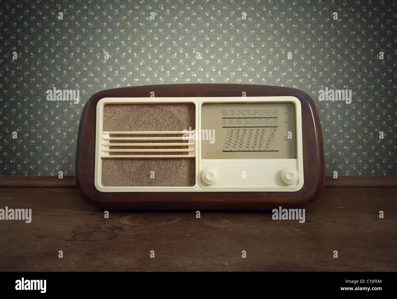 antique radio on vintage background Stock Photo - Alamy