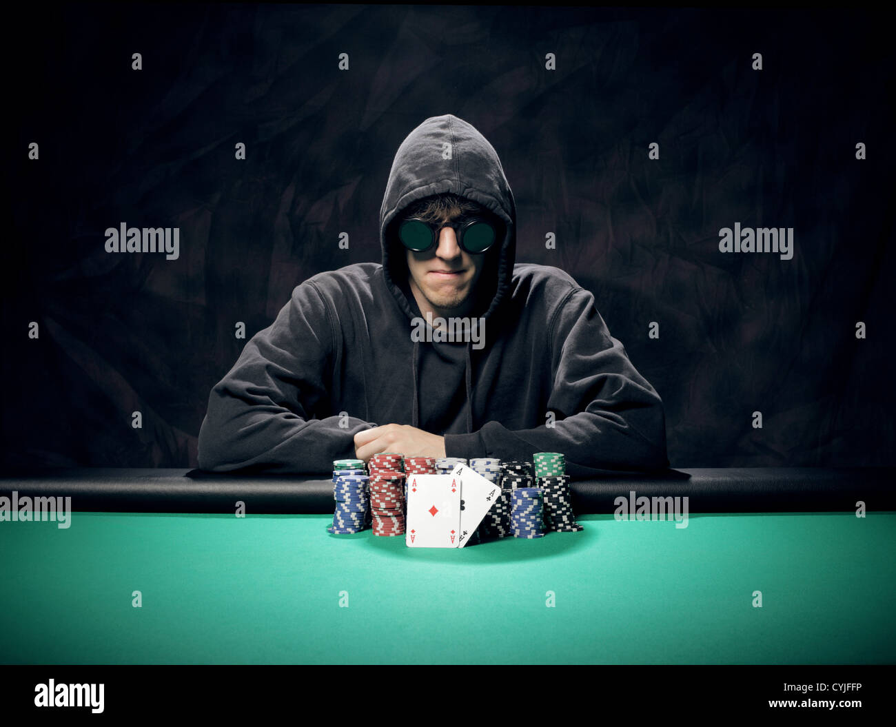 Portrait of a professional poker player Stock Photo - Alamy