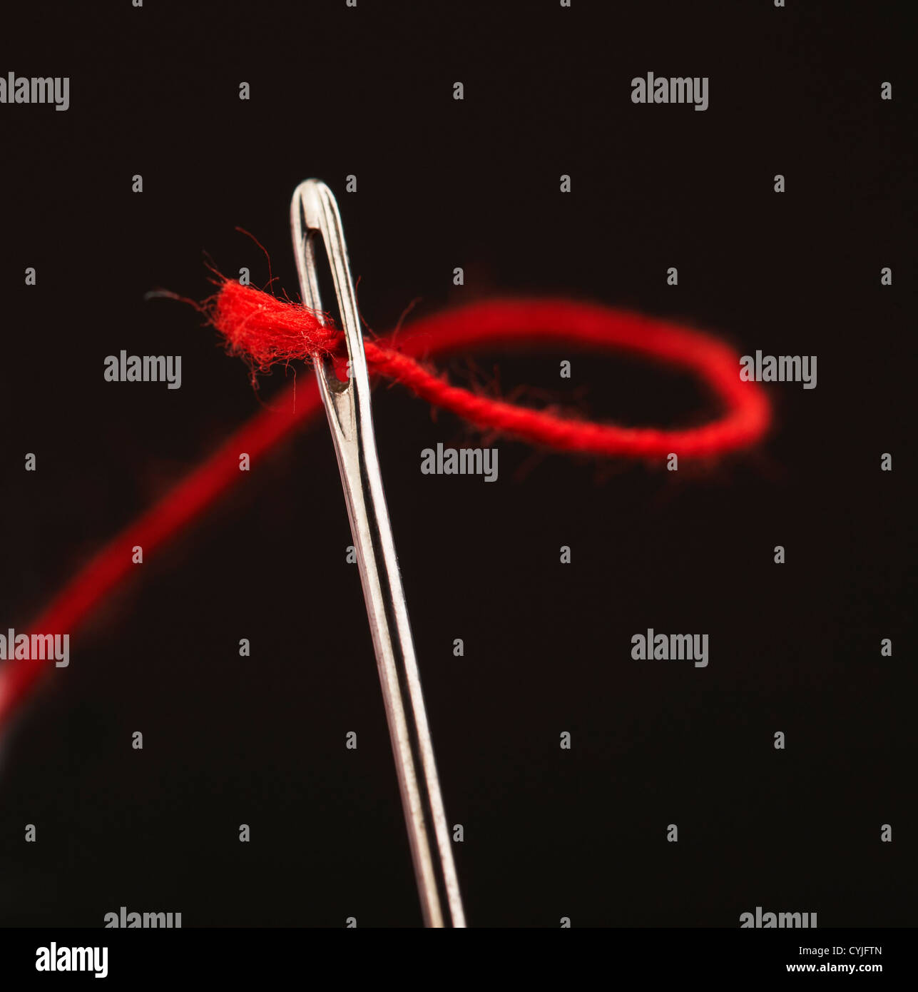 White thread and needle hi-res stock photography and images - Alamy