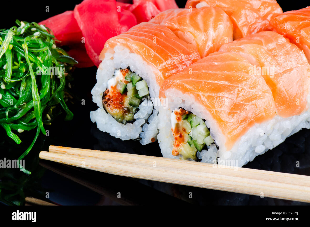 Traditional japanese food roll made of salmon Stock Photo - Alamy
