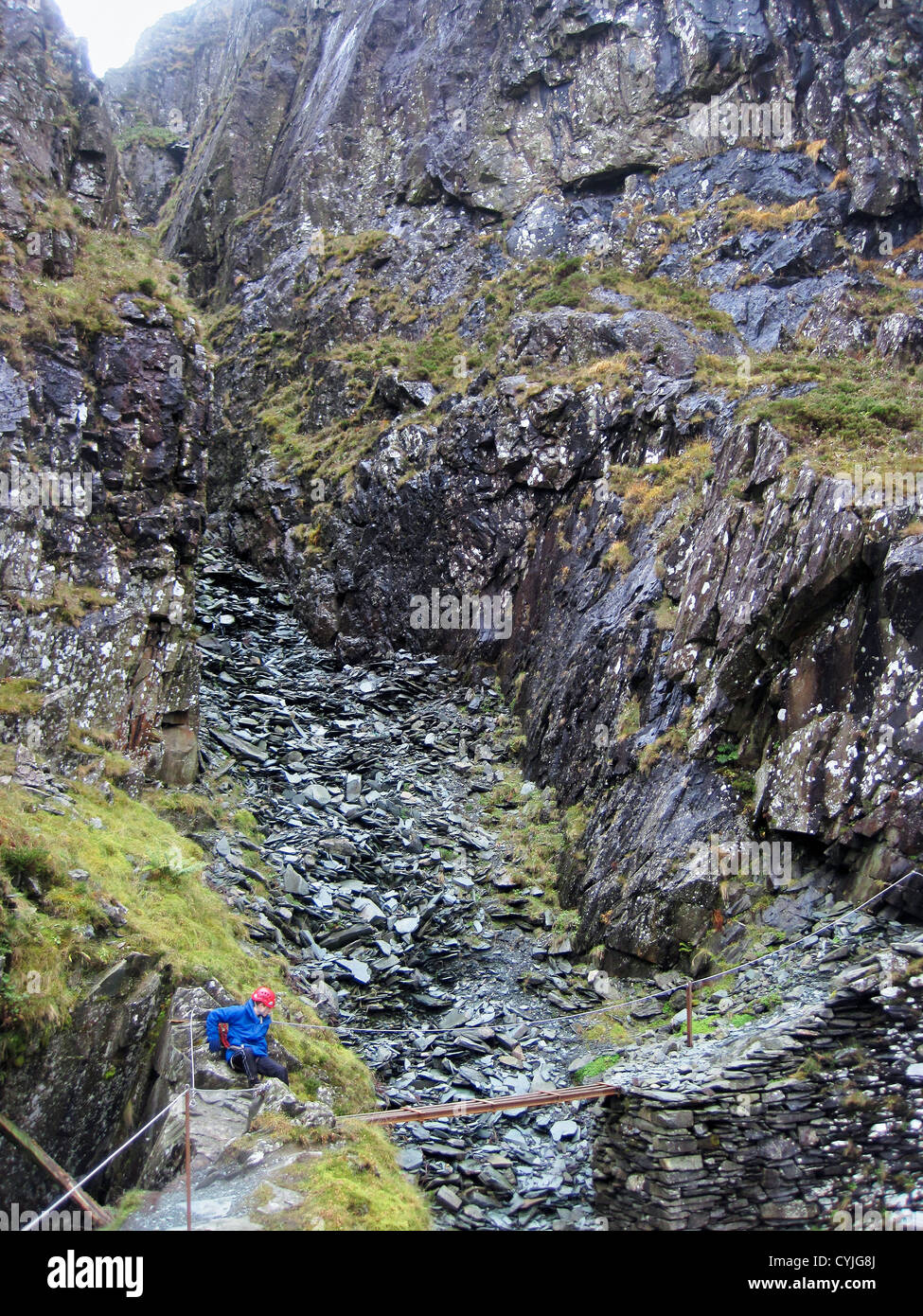 Tourists follow a Via Ferrata route at Honister Slate Mine in the Lake ...