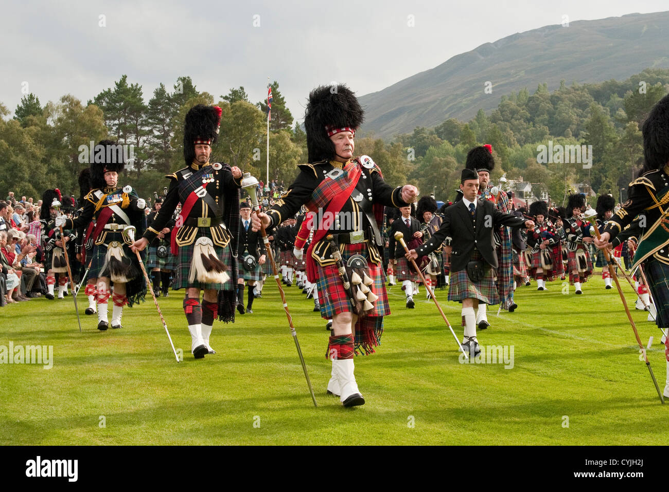 Scottish Massed Pipe Bands marching at the "Braemar Gathering ...