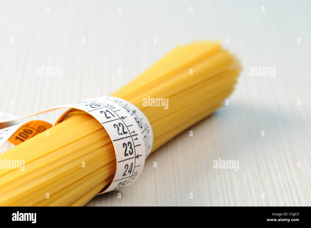diet concept, Spaghetti with measuring tape Stock Photo - Alamy