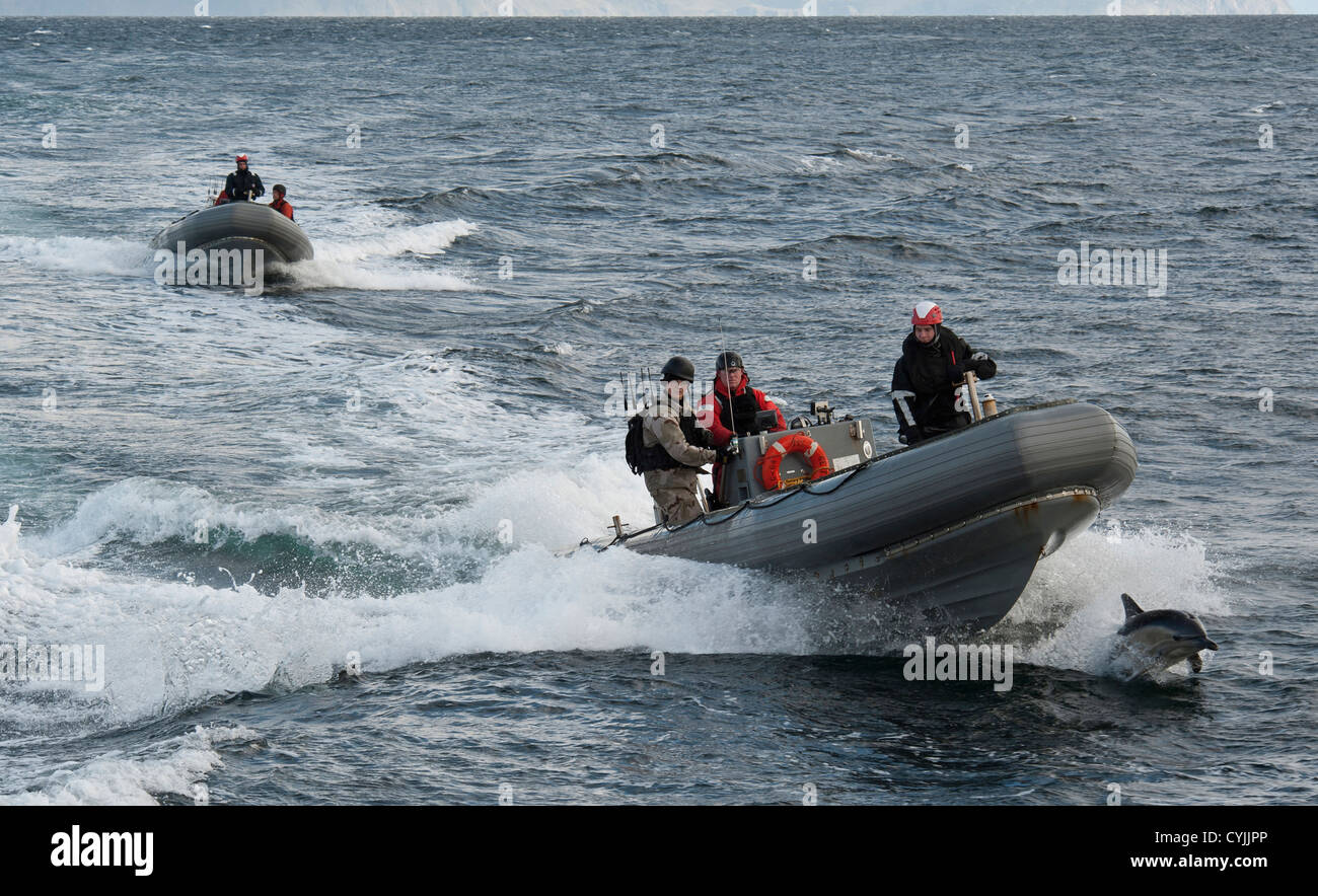 A US Navy rigid-hull inflatable boat from the guided-missile cruiser ...