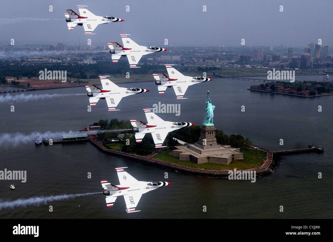 The US Air Force Thunderbirds fly over the Statue of Liberty prior to ...