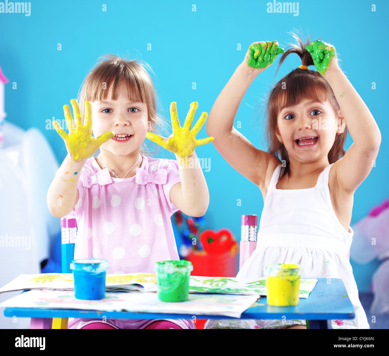 Children drawing in the nursery Stock Photo - Alamy