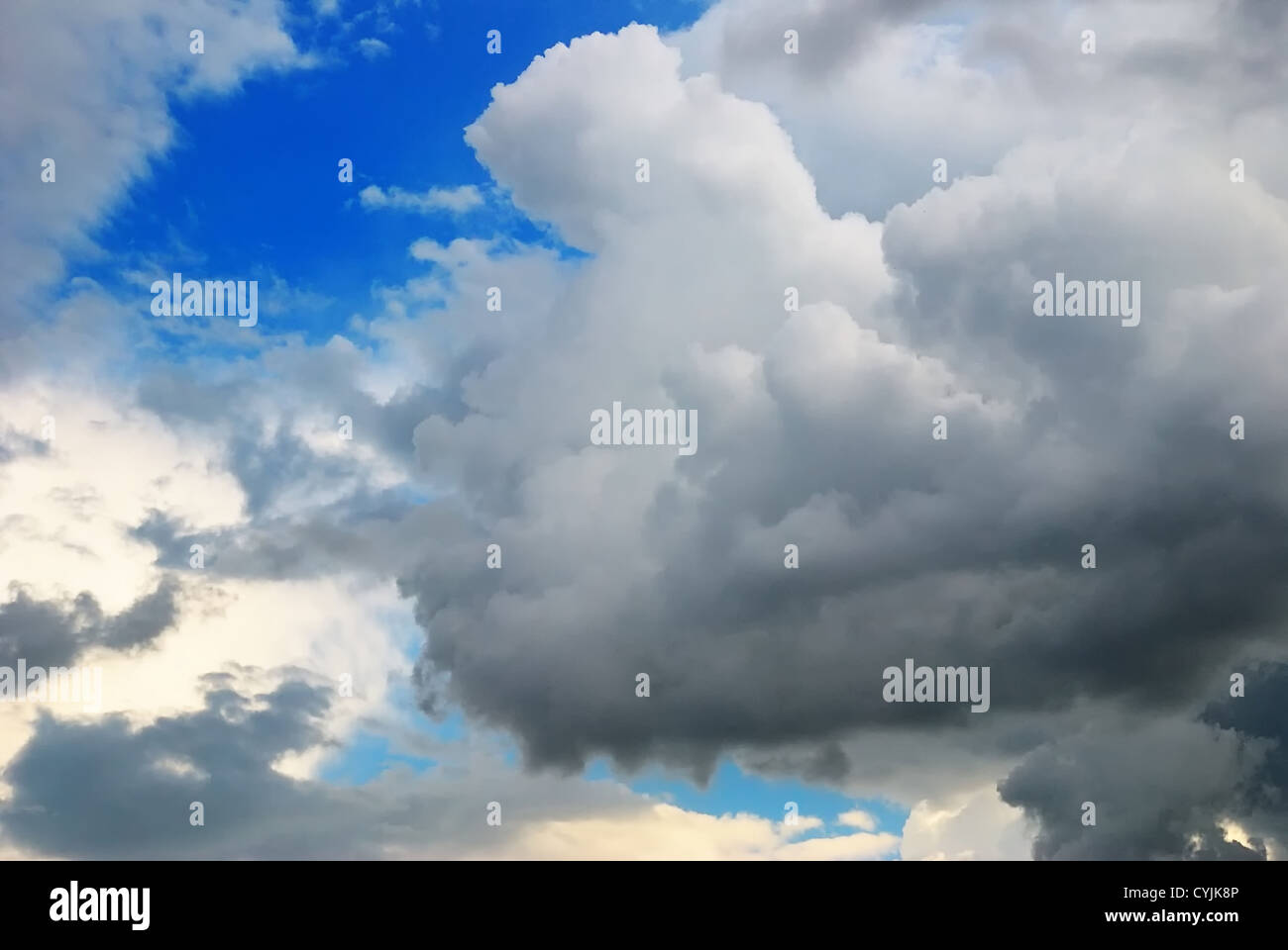 Cloudy sky full of deep grey thunder clouds on the sunset Stock Photo ...